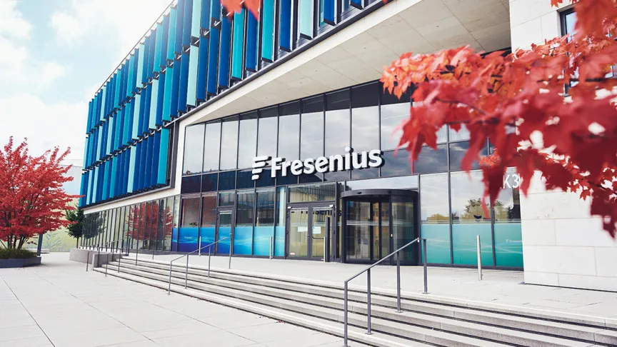 Modern Fresenius building with a glass façade and blue‑green accents ...